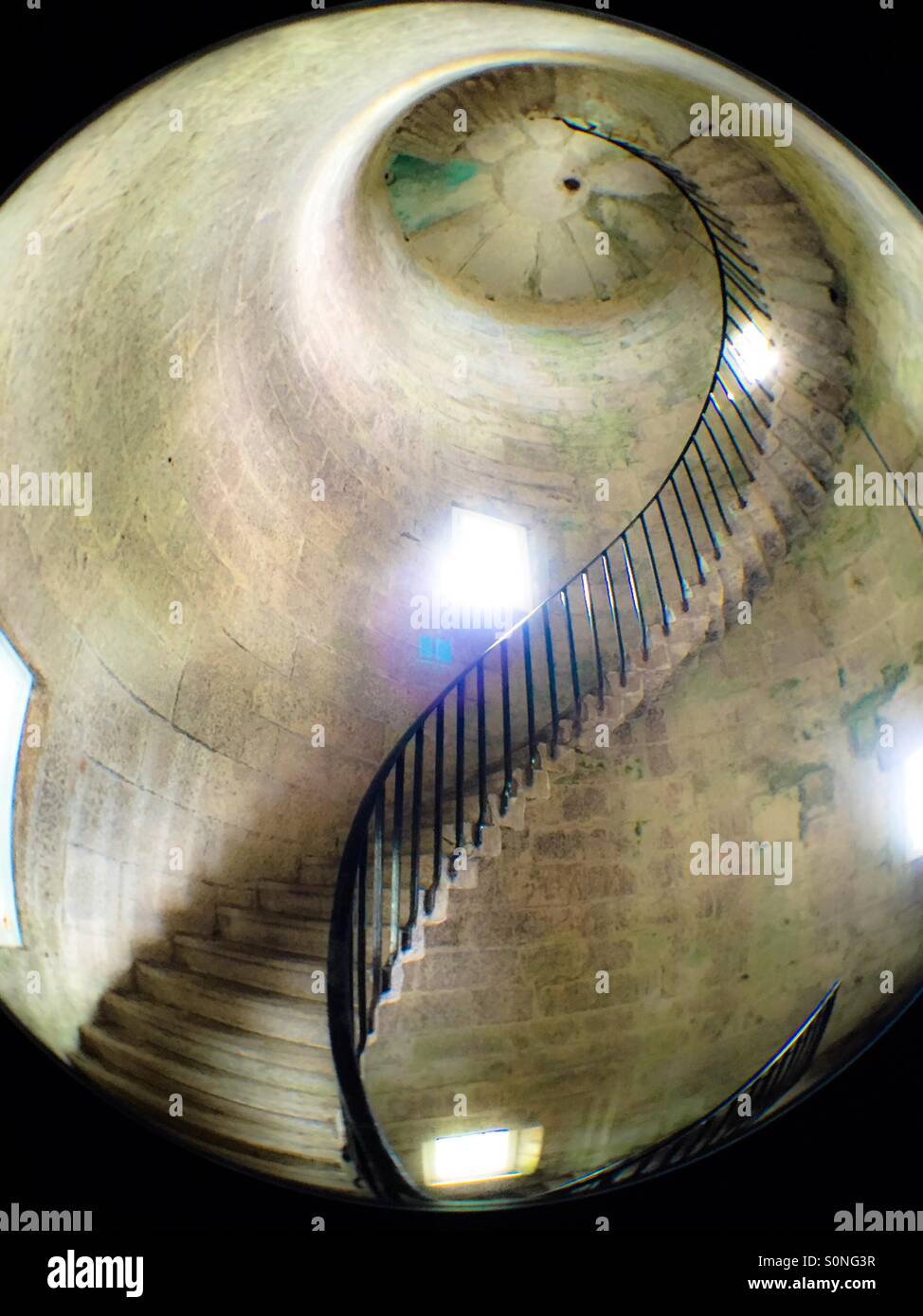 Spiral staircase in an old lighthouse Stock Photo - Alamy