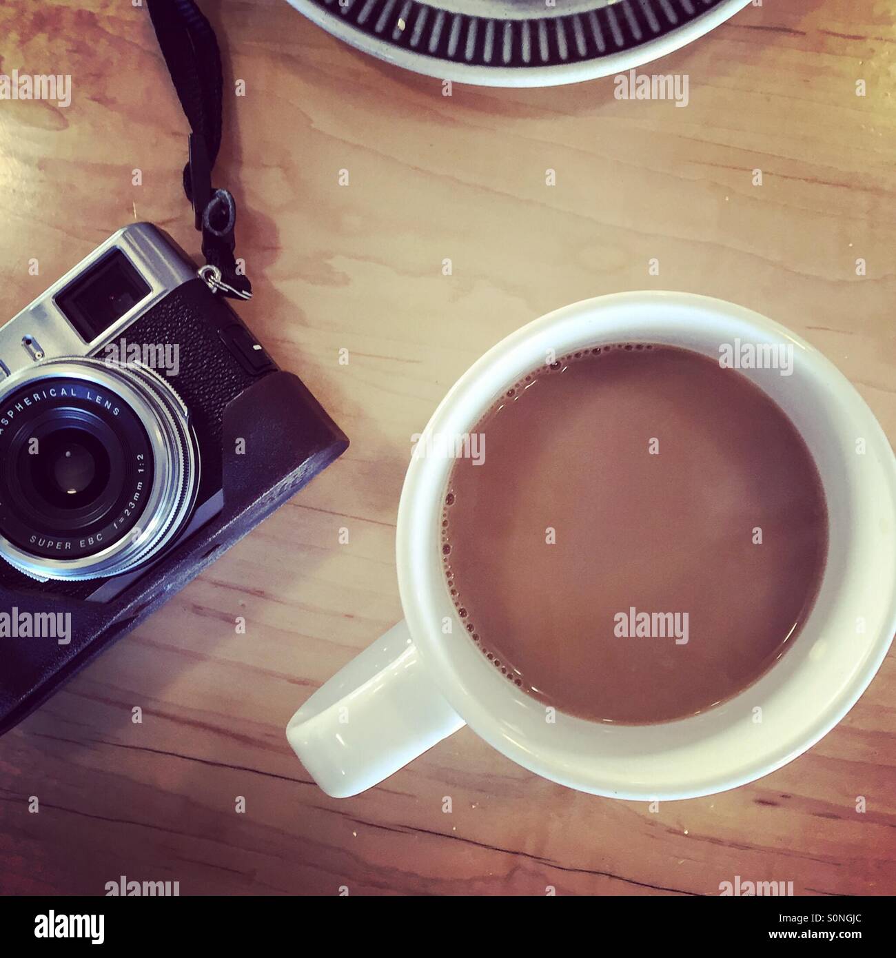 Coffee and camera Stock Photo - Alamy