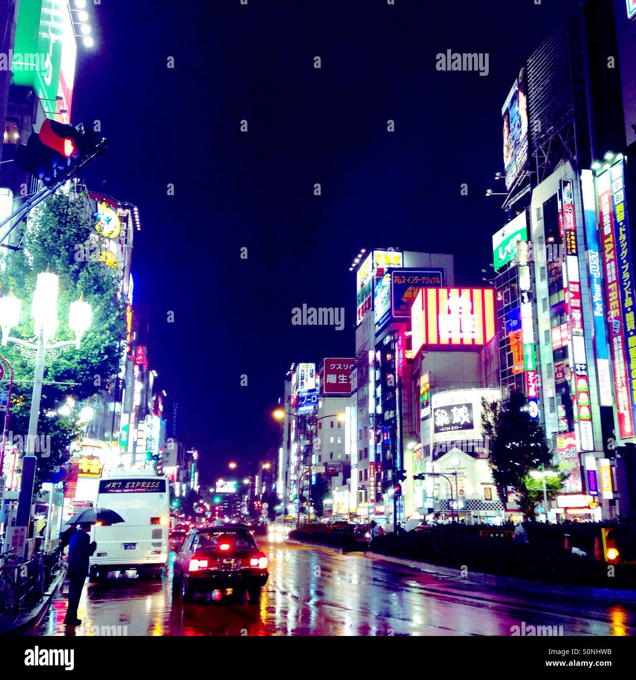 Rainy night downtown, Shinjuku, Japan Stock Photo - Alamy