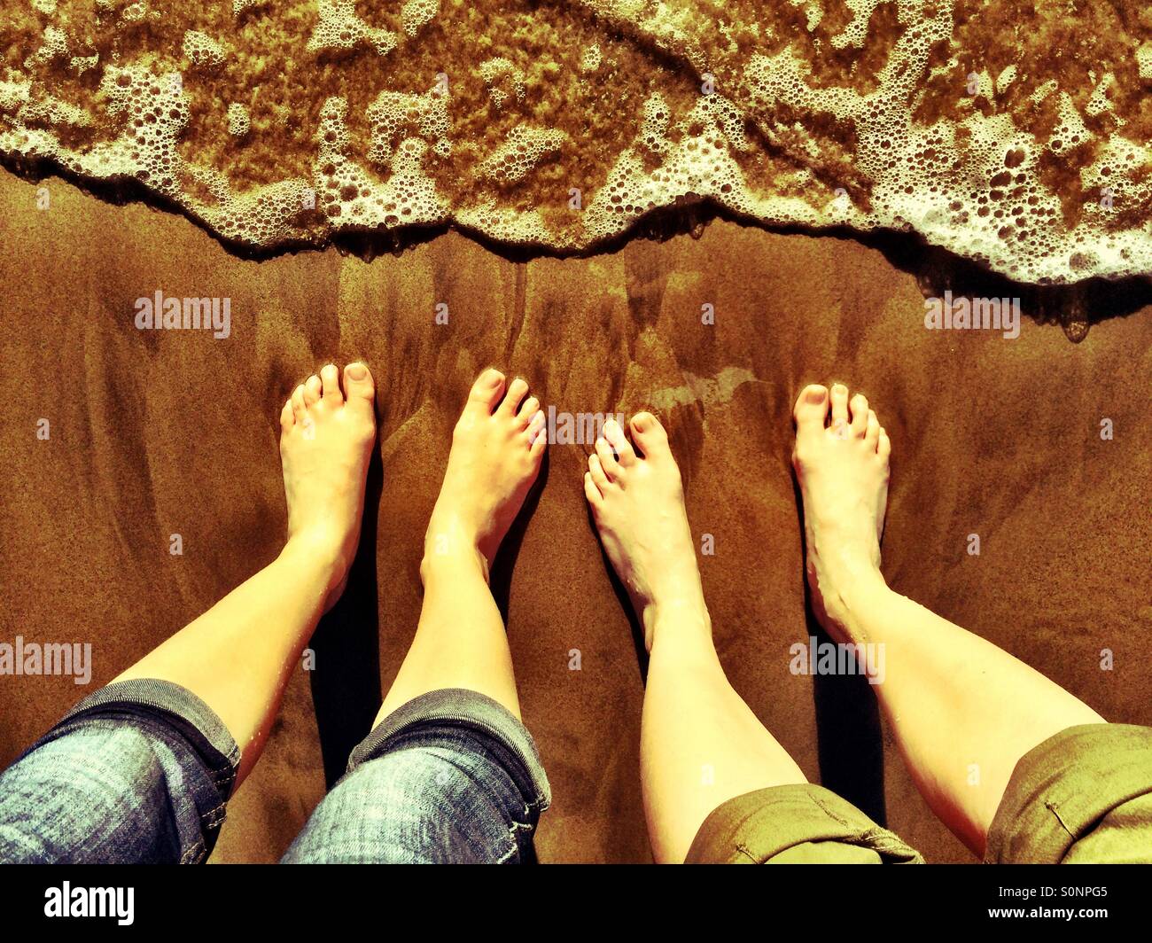 Toes in water hi-res stock photography and images - Alamy