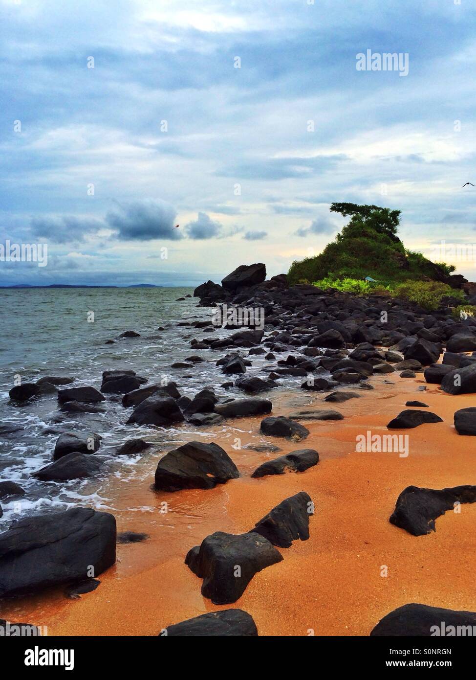 Rocks in the sea Stock Photo - Alamy