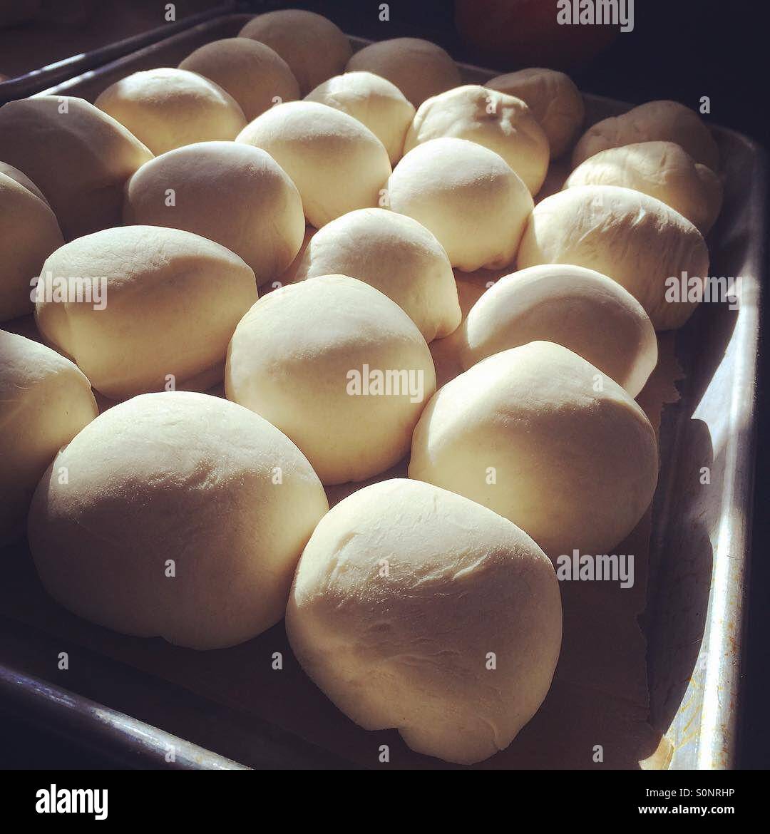Buns in an oven Stock Photo - Alamy