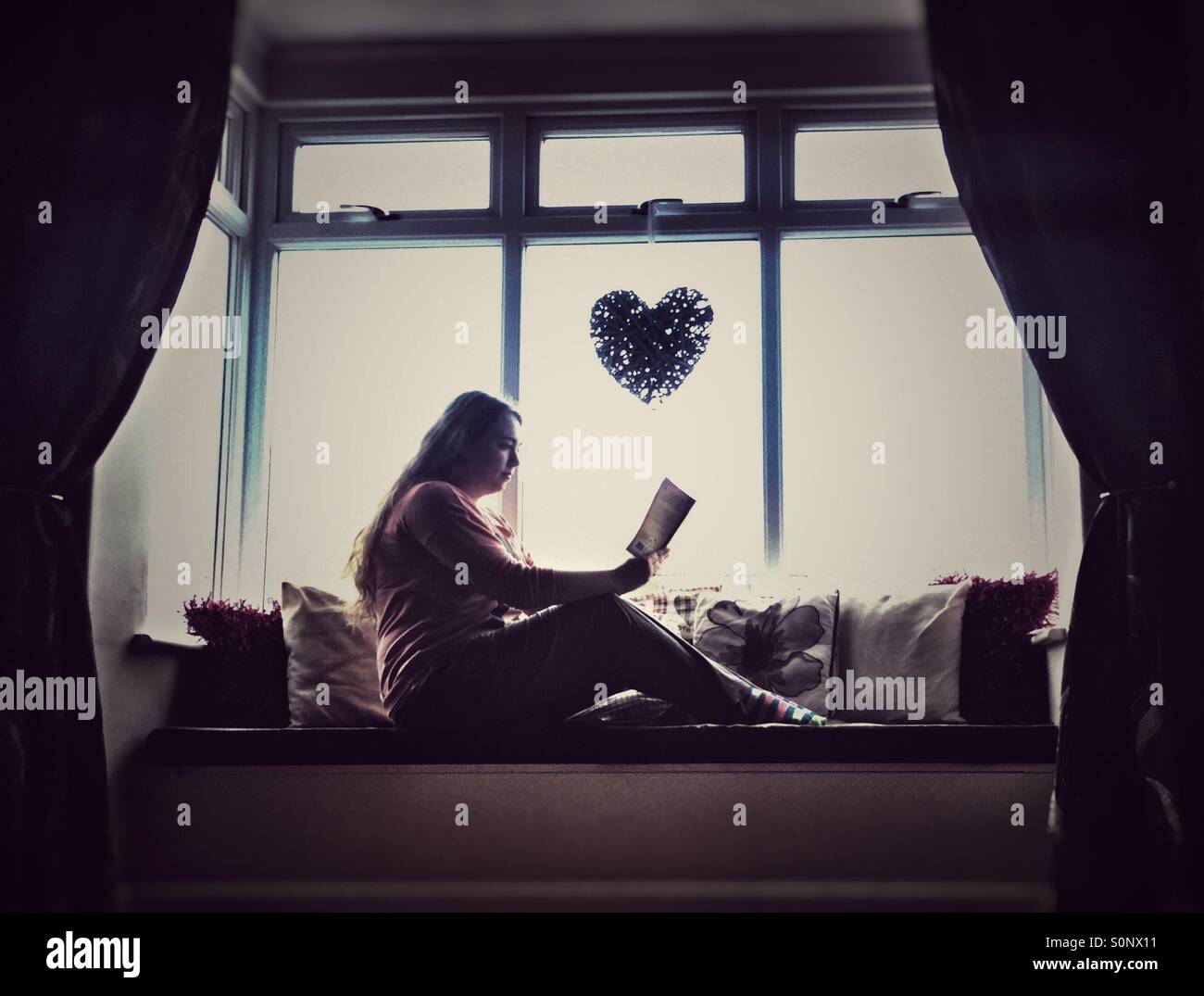 Heart reading hi-res stock photography and images - Alamy