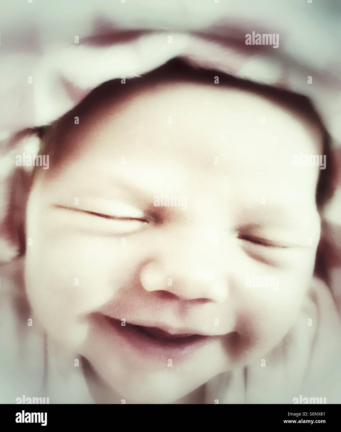 Laughing infant hi-res stock photography and images - Alamy
