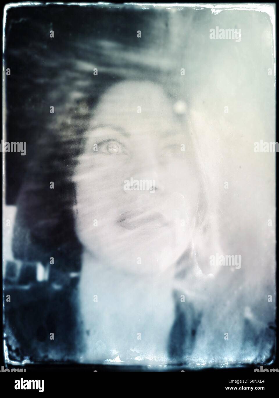 Woman in car with sunbeam across face Stock Photo - Alamy