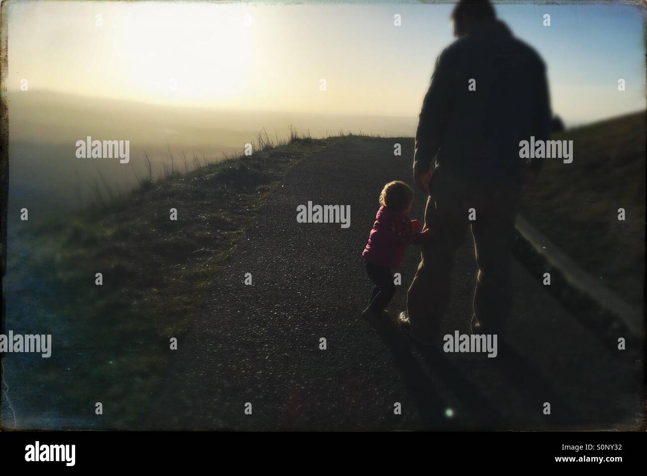 Baby first steps Stock Photo - Alamy