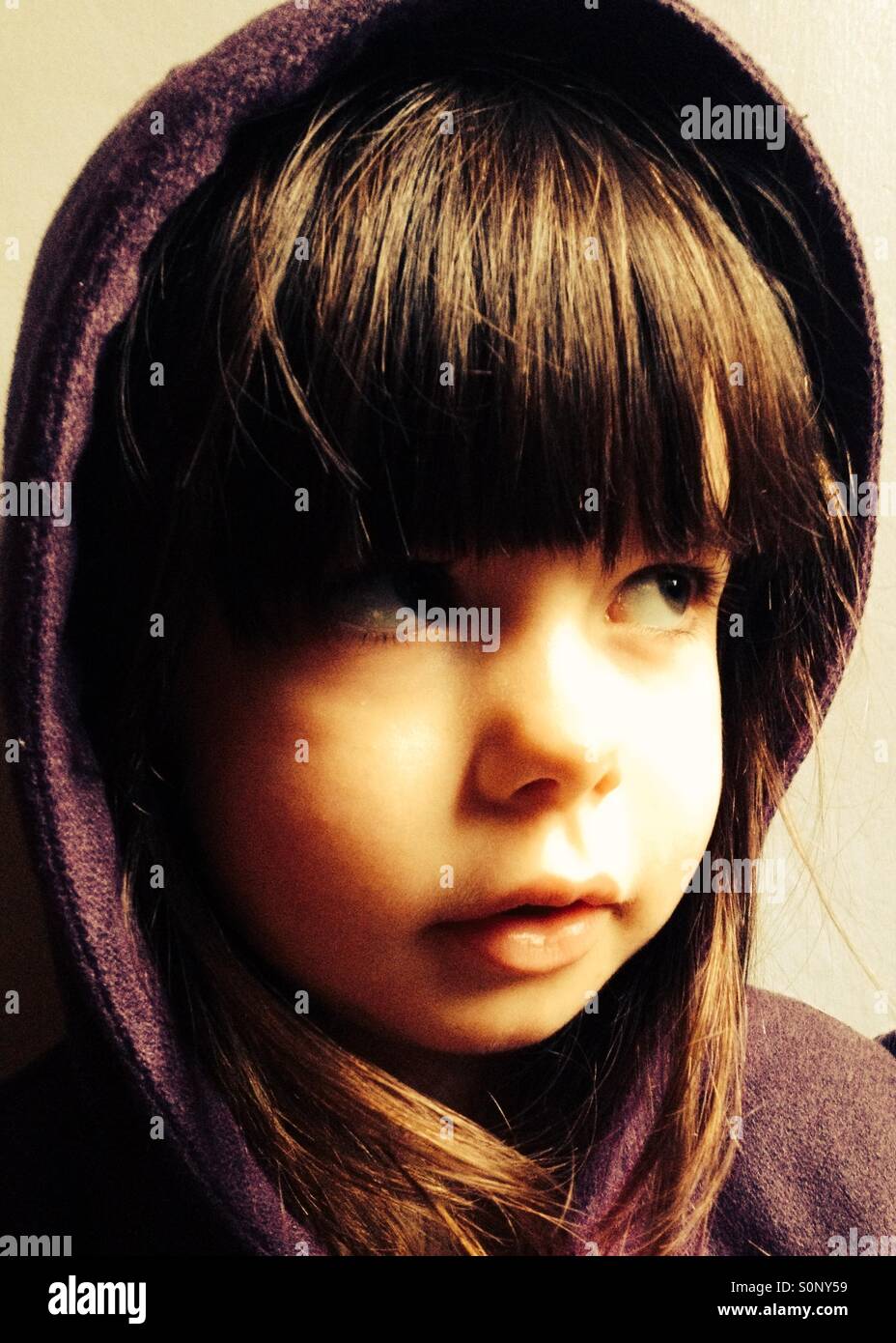 Young girl wearing hooded top Stock Photo - Alamy
