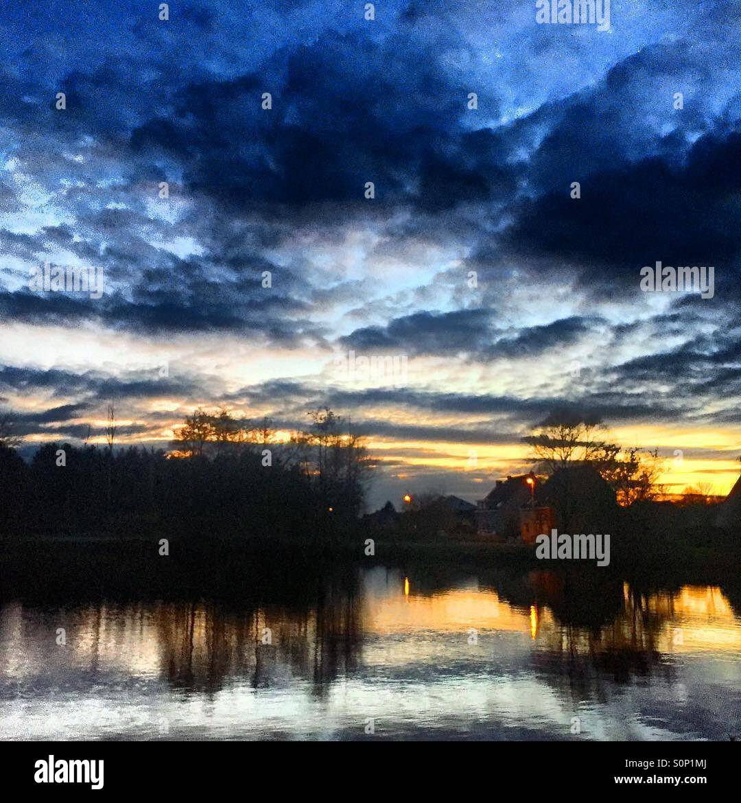 Reflections of a Sunset Stock Photo - Alamy