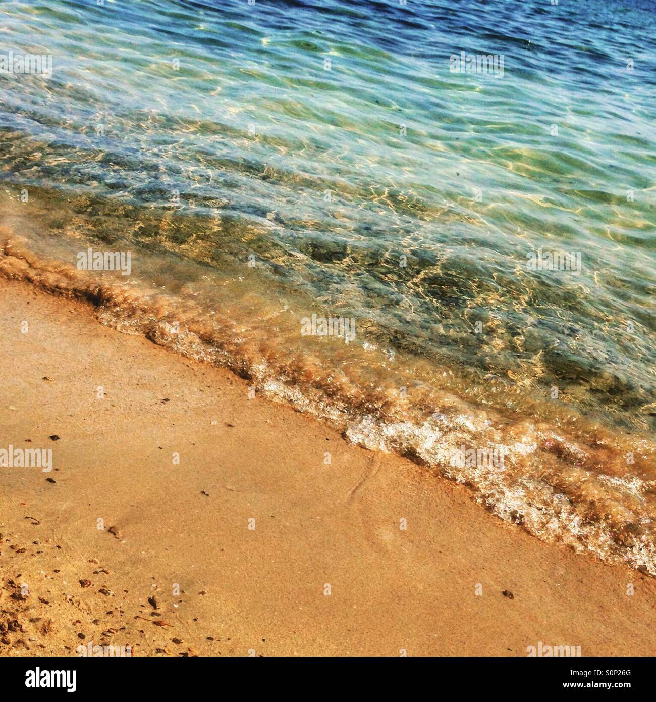 Lapping waves hi-res stock photography and images - Alamy