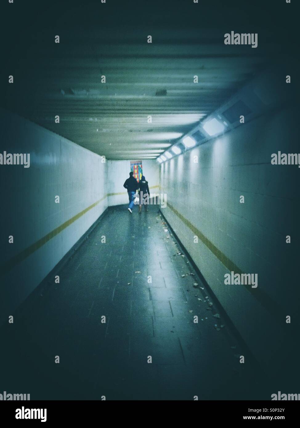 Walking through an underpass subway route Stock Photo - Alamy