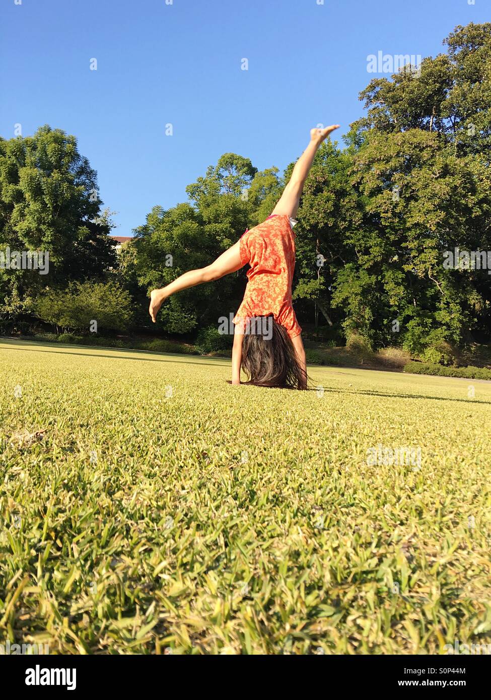 Cartwheels hi-res stock photography and images - Alamy