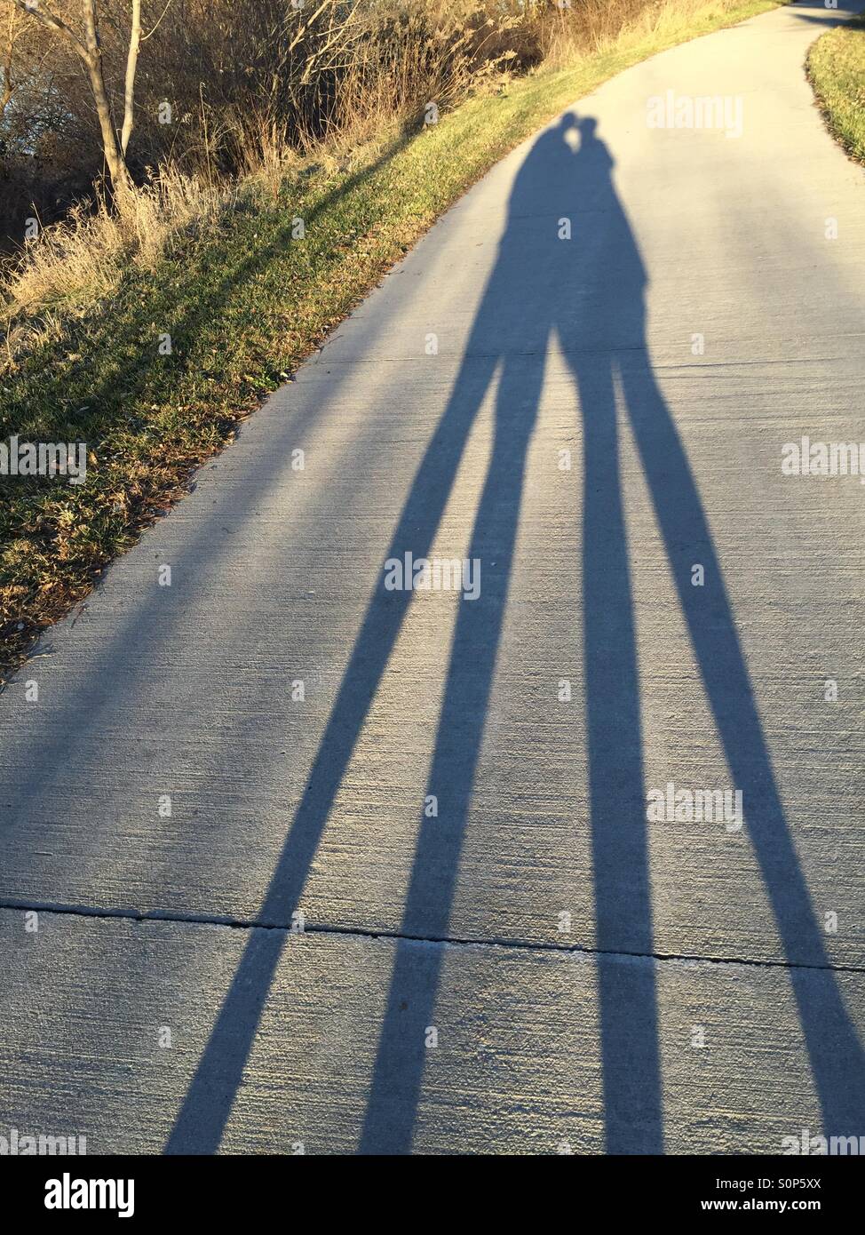 Shadows of couple kissing Stock Photo - Alamy