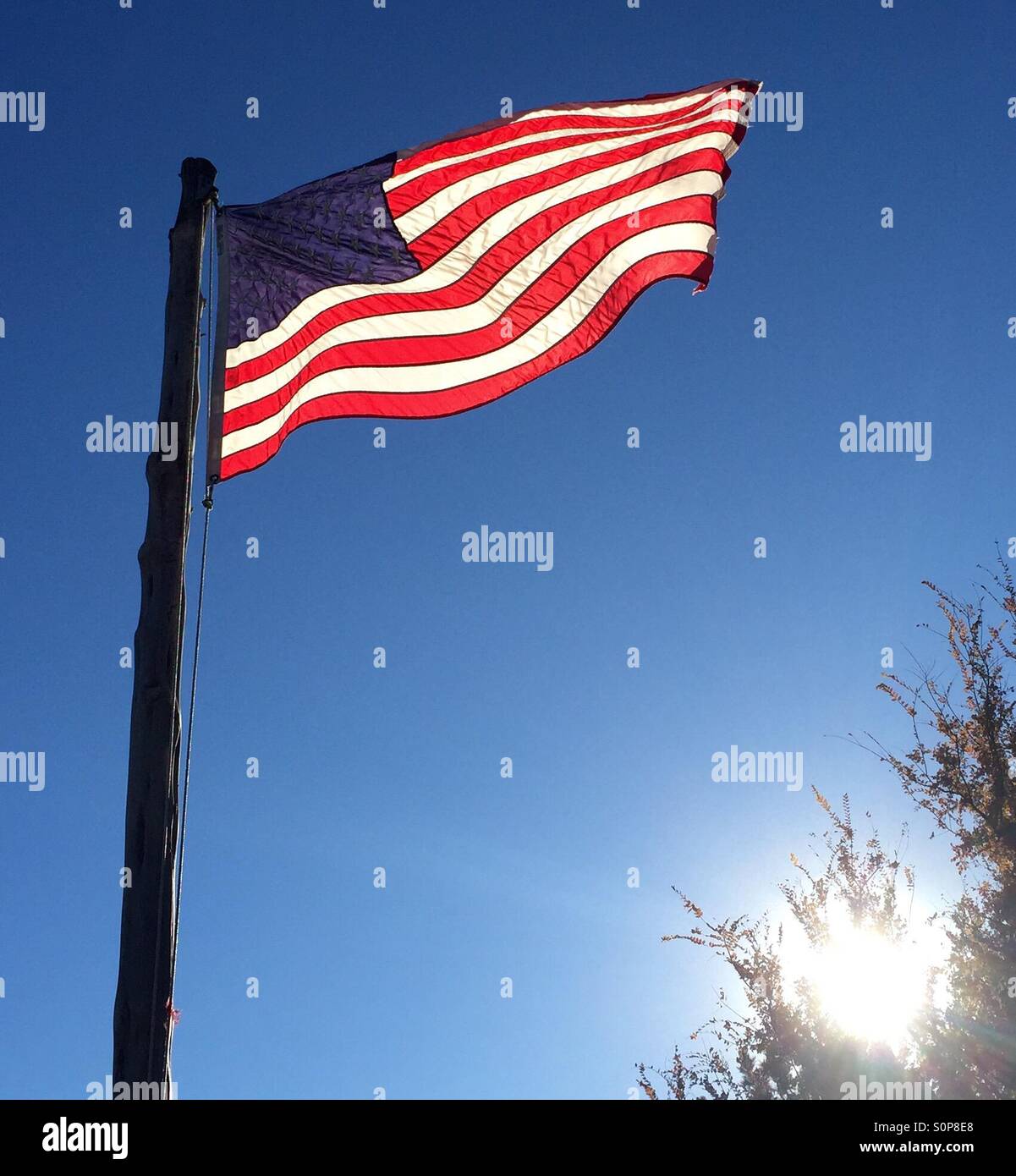 American flag blowing in the wind hi-res stock photography and images ...