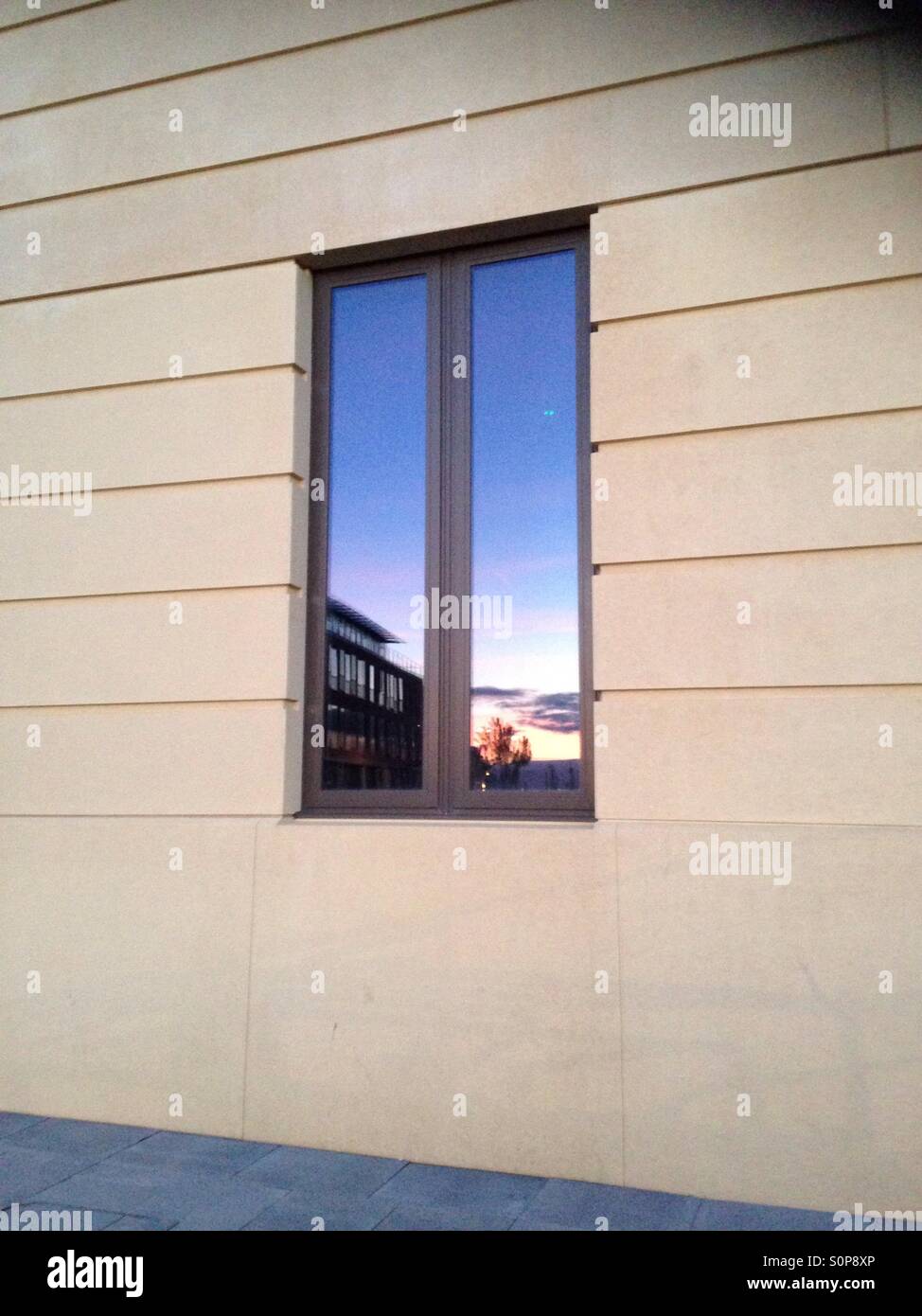 Sunset window reflect Stock Photo - Alamy