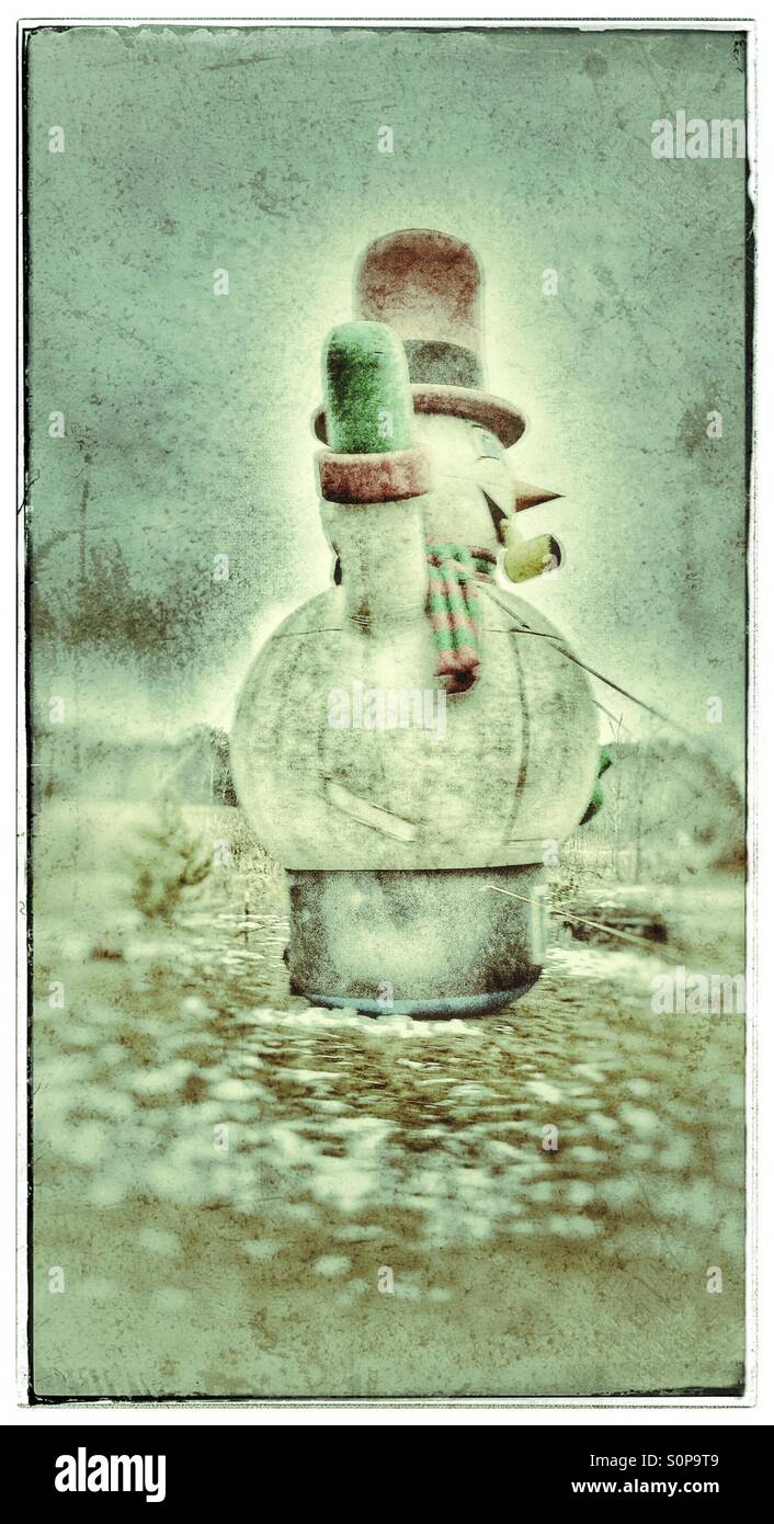 Side view of a blow up frosty the snowman Stock Photo - Alamy