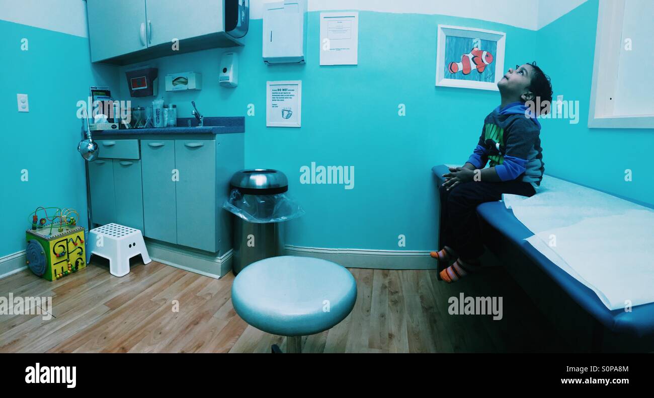 Waiting for Doctor to come and visit Stock Photo - Alamy