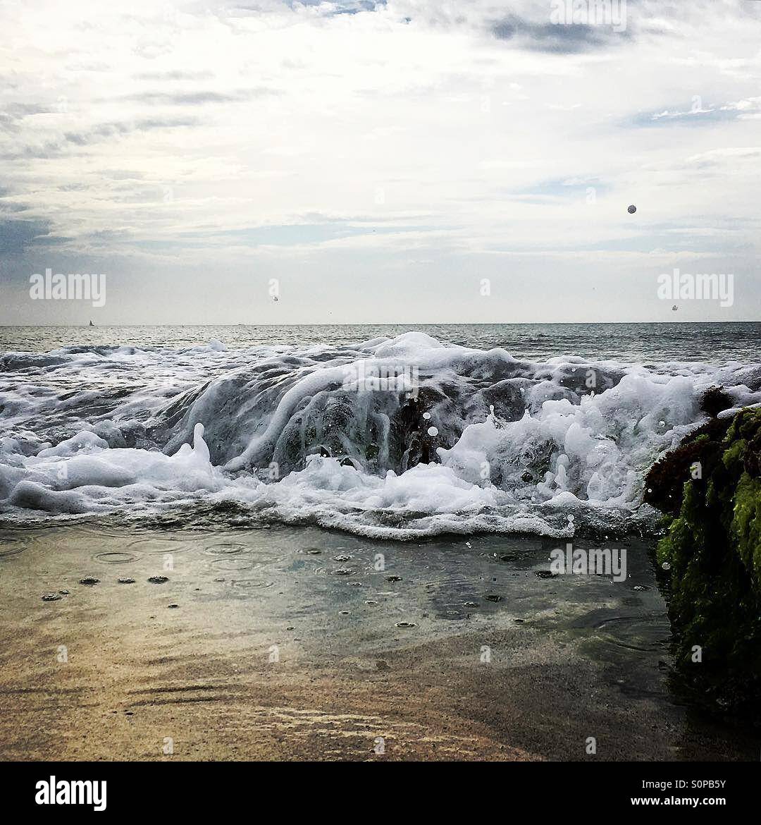 Moving over ocean waves crashing hi-res stock photography and images ...