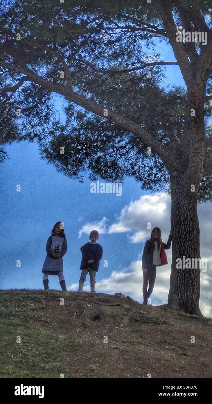 Child park tree hi-res stock photography and images - Alamy
