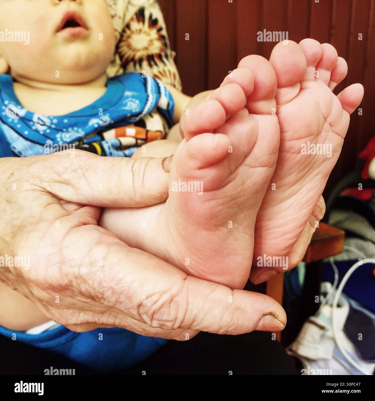 Baby feet hi-res stock photography and images - Alamy