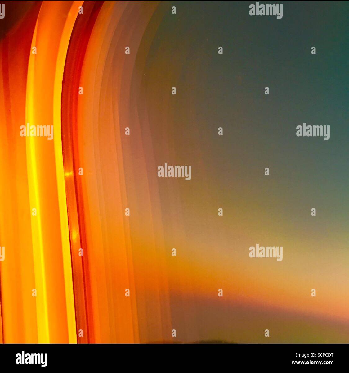 Sun reflecting off plane window Stock Photo - Alamy