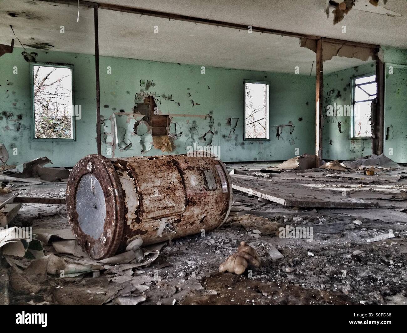 Messy room in abandoned building Stock Photo - Alamy