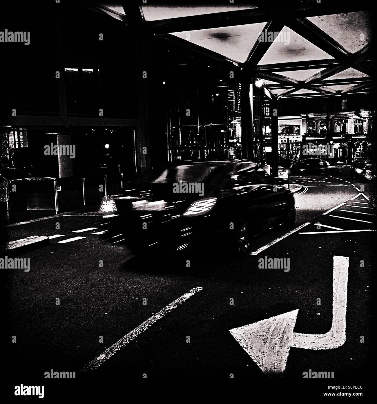 Curved arrow road marking hi-res stock photography and images - Alamy