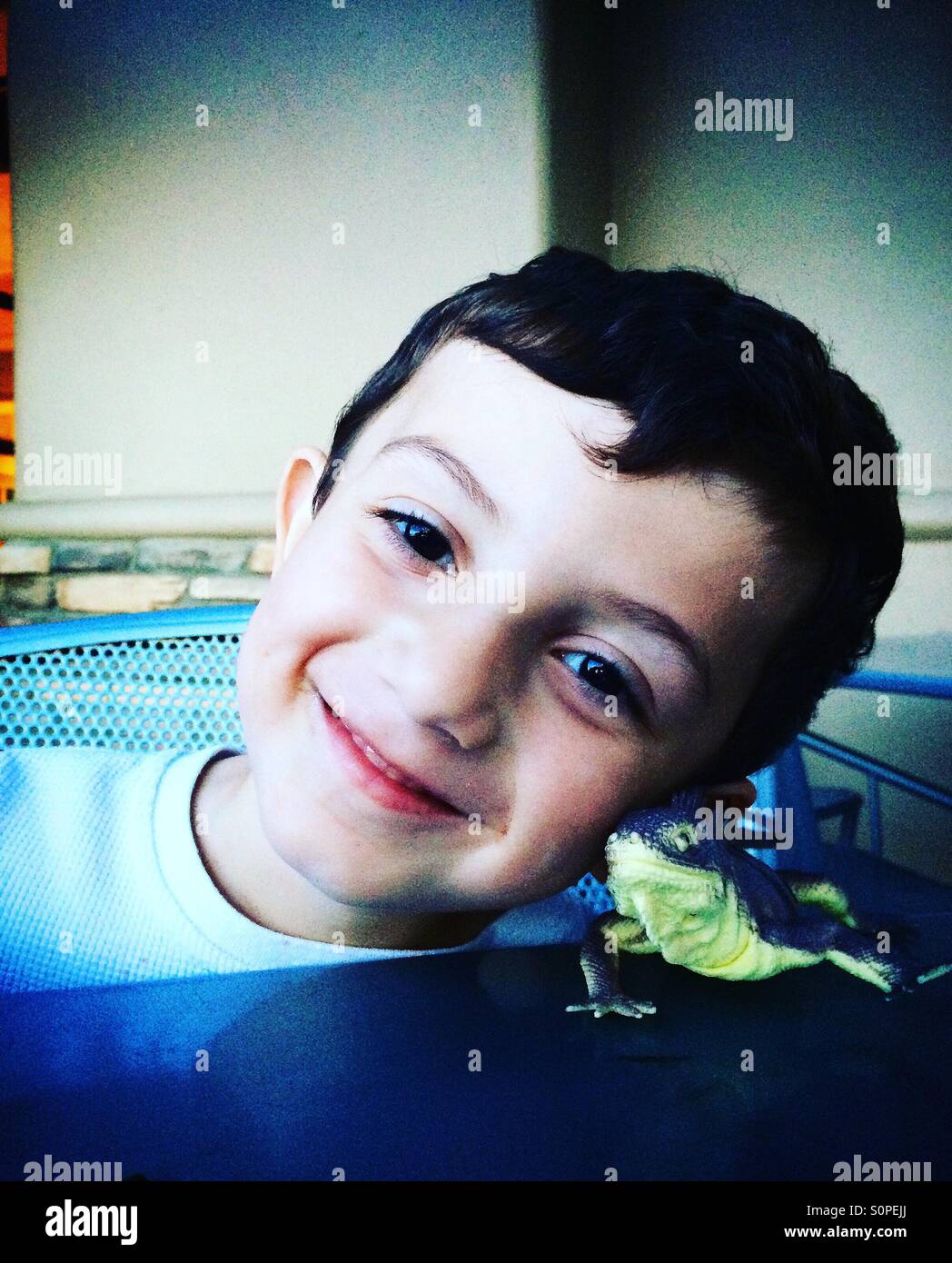 Little boy with toy Bearded Dragon Lizard Stock Photo - Alamy