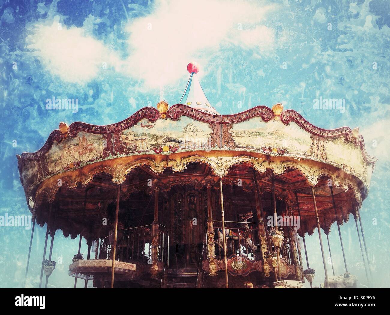 Old carousel in the amusement park Stock Photo - Alamy