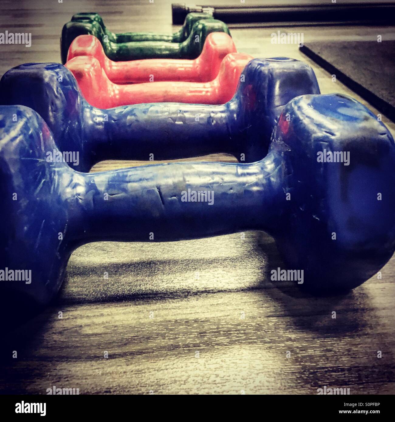 Worn out weights Stock Photo - Alamy