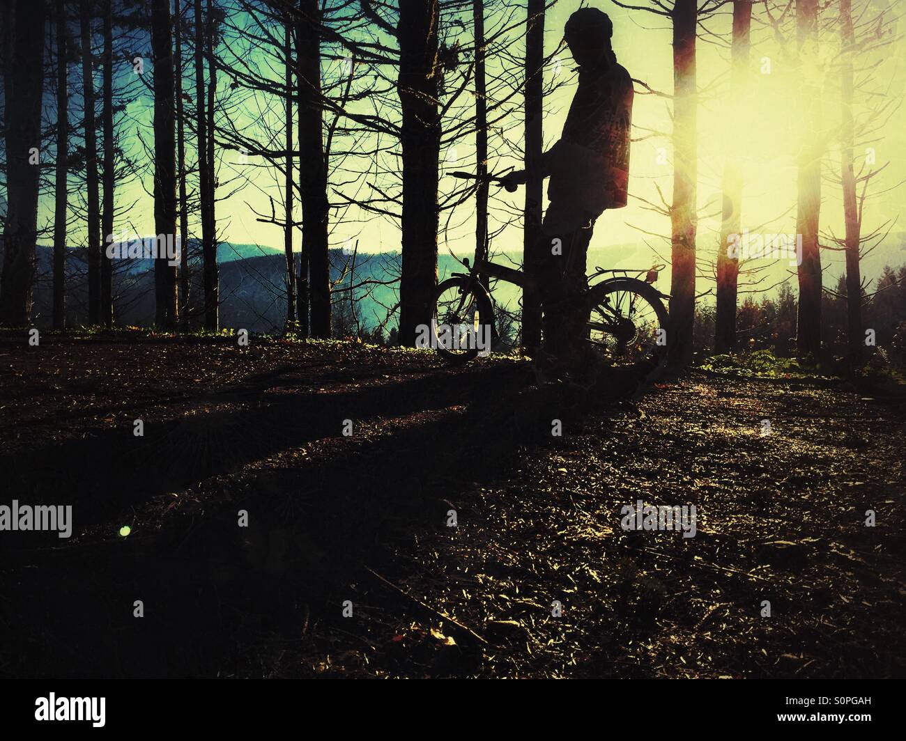 Silhouette man bicycle hi-res stock photography and images - Alamy