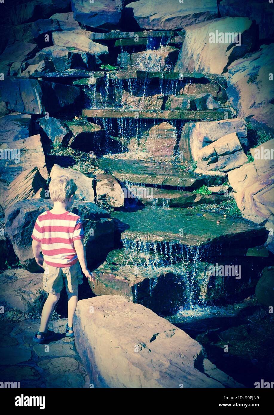 Waterfall boy hi-res stock photography and images - Alamy