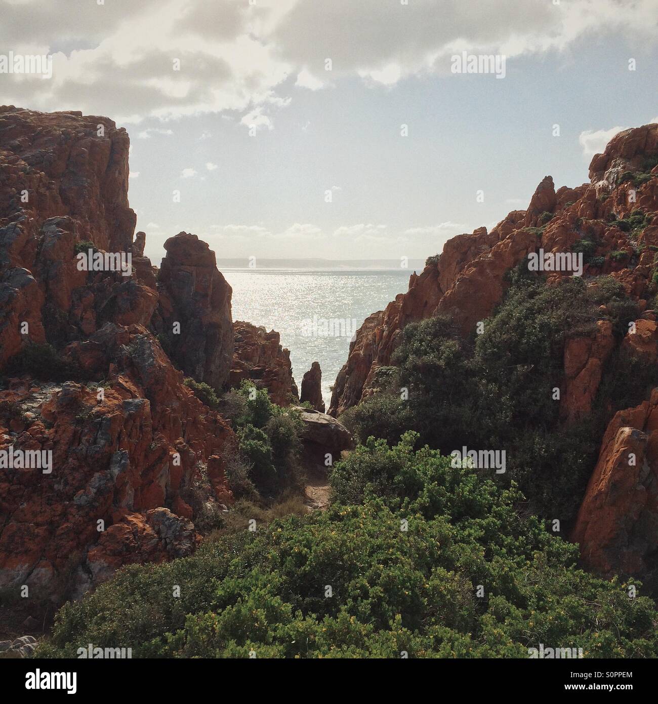 Behind the rocks hi-res stock photography and images - Alamy