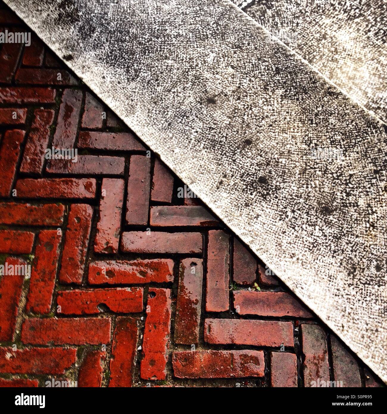 Brick and stone shine in the rain Stock Photo - Alamy