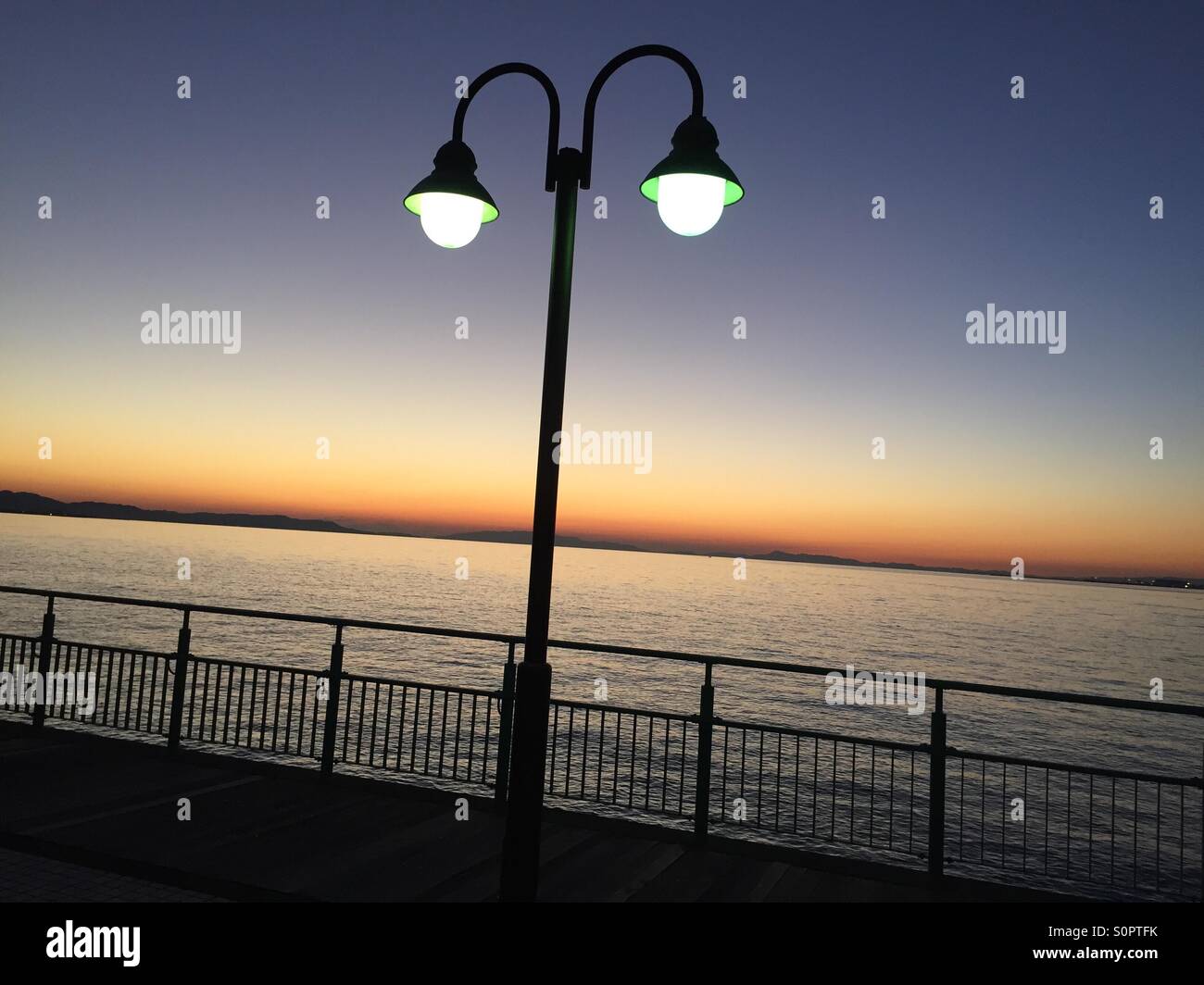 Lamp post at twilight hi-res stock photography and images - Alamy