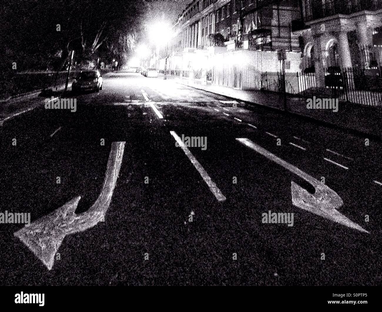 Road signs after dark Stock Photo - Alamy