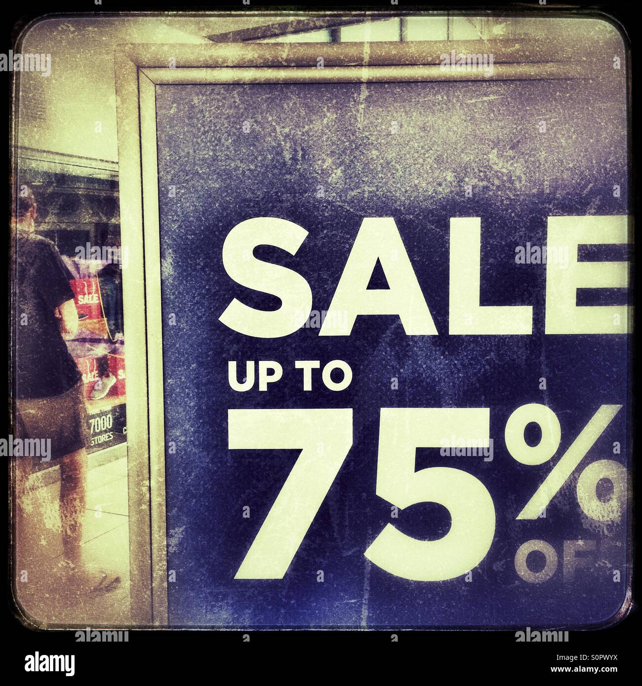 Sale sign in shopping mall Stock Photo - Alamy