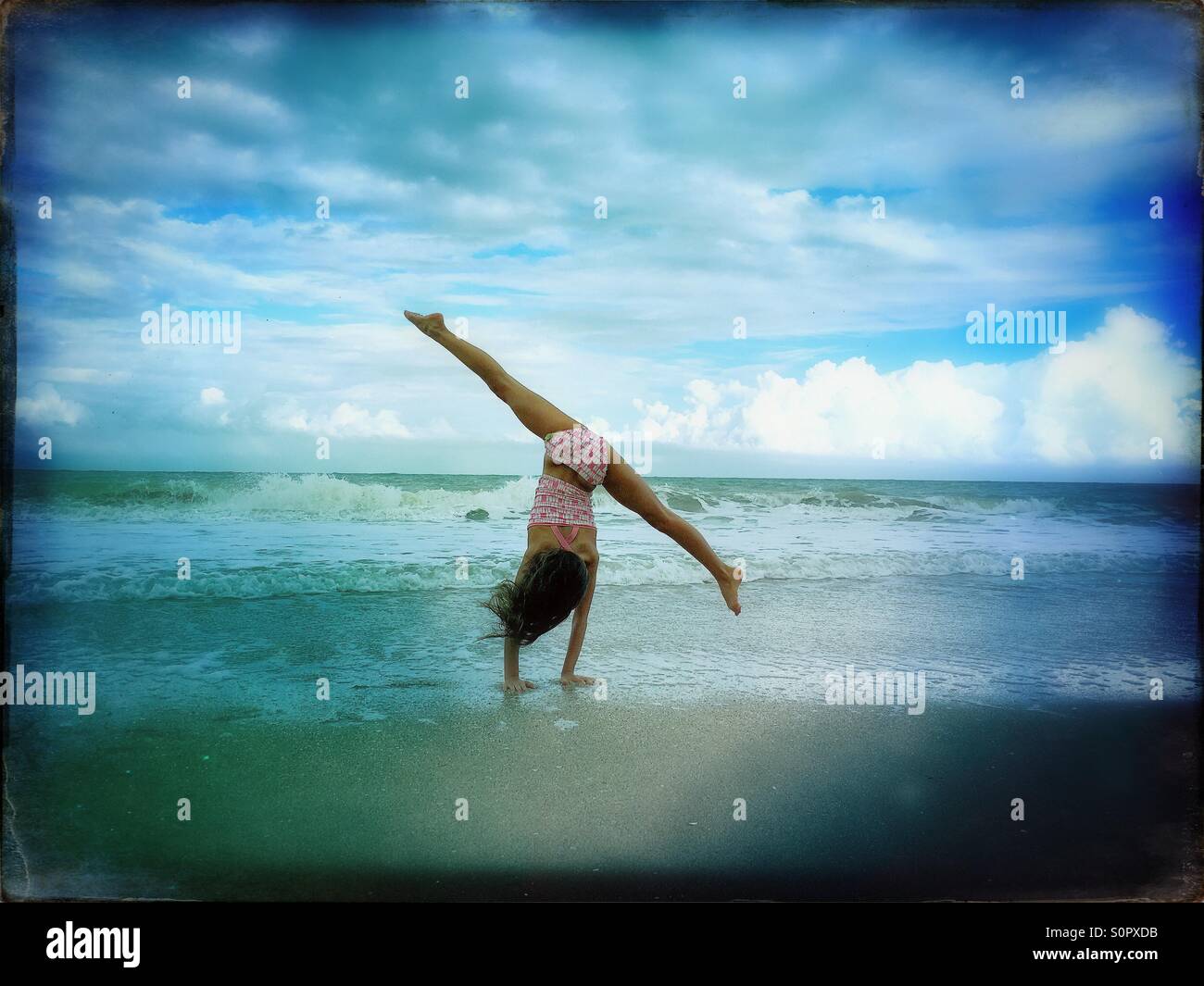 Girl cartwheel hi-res stock photography and images - Alamy