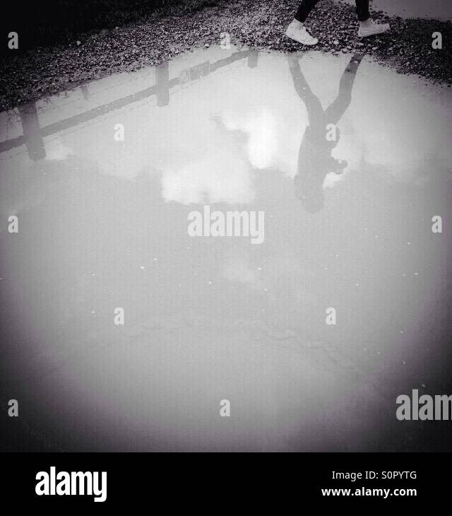 Stepping puddle hi-res stock photography and images - Alamy