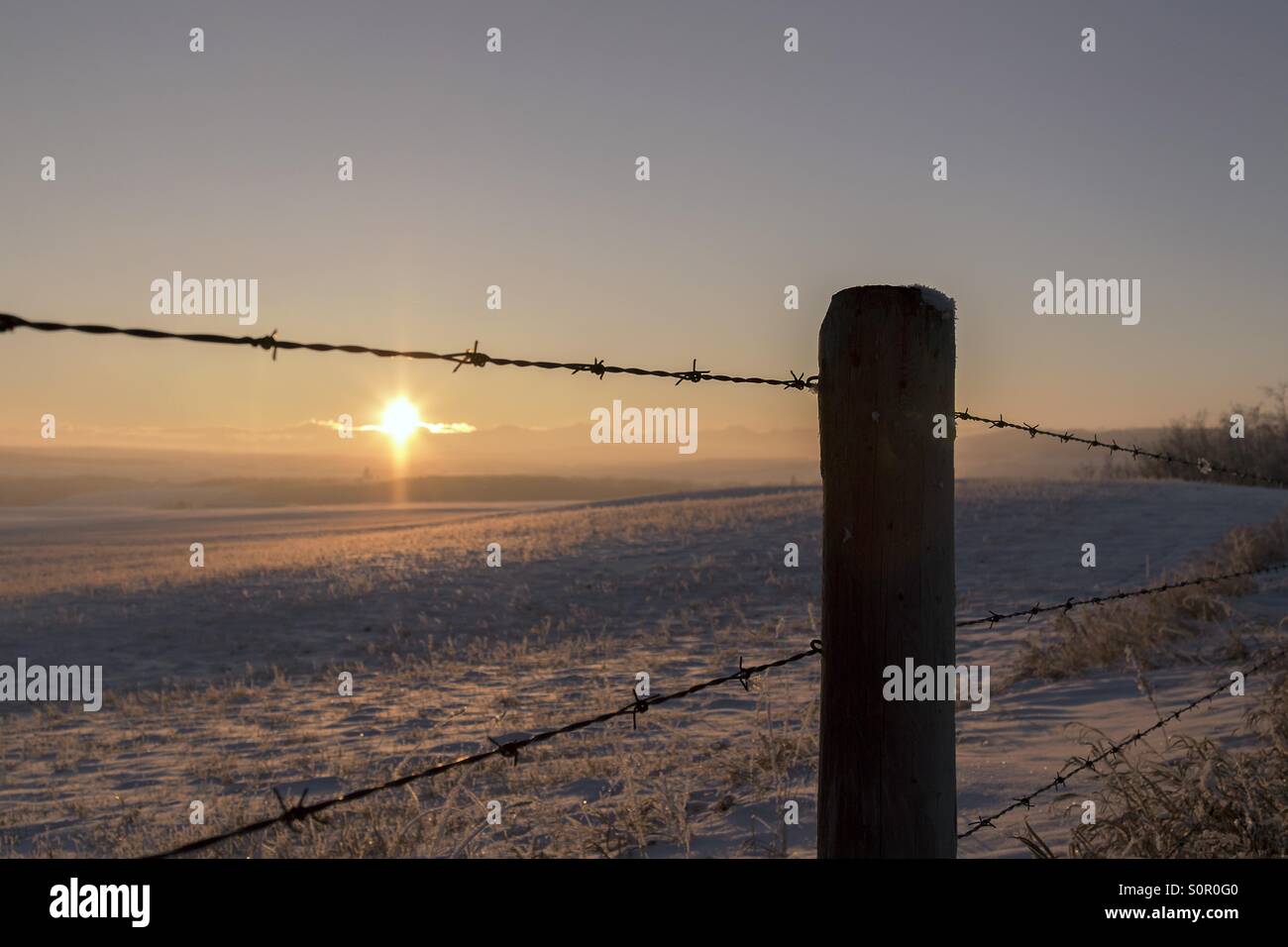 Ranch fence at sunset hi-res stock photography and images - Alamy