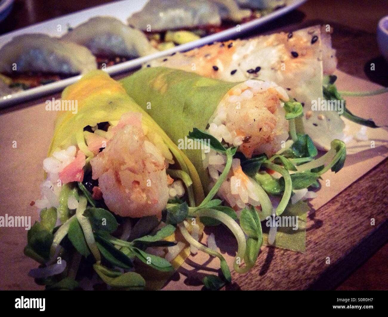 Sushi cone and dumplings Stock Photo - Alamy