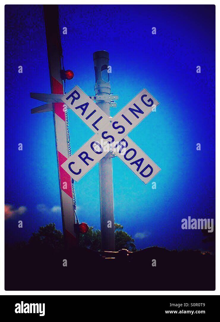 Railroad crossing sign Stock Photo - Alamy