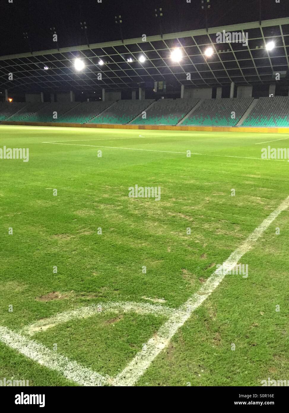 Empty football field at night hi-res stock photography and images - Alamy