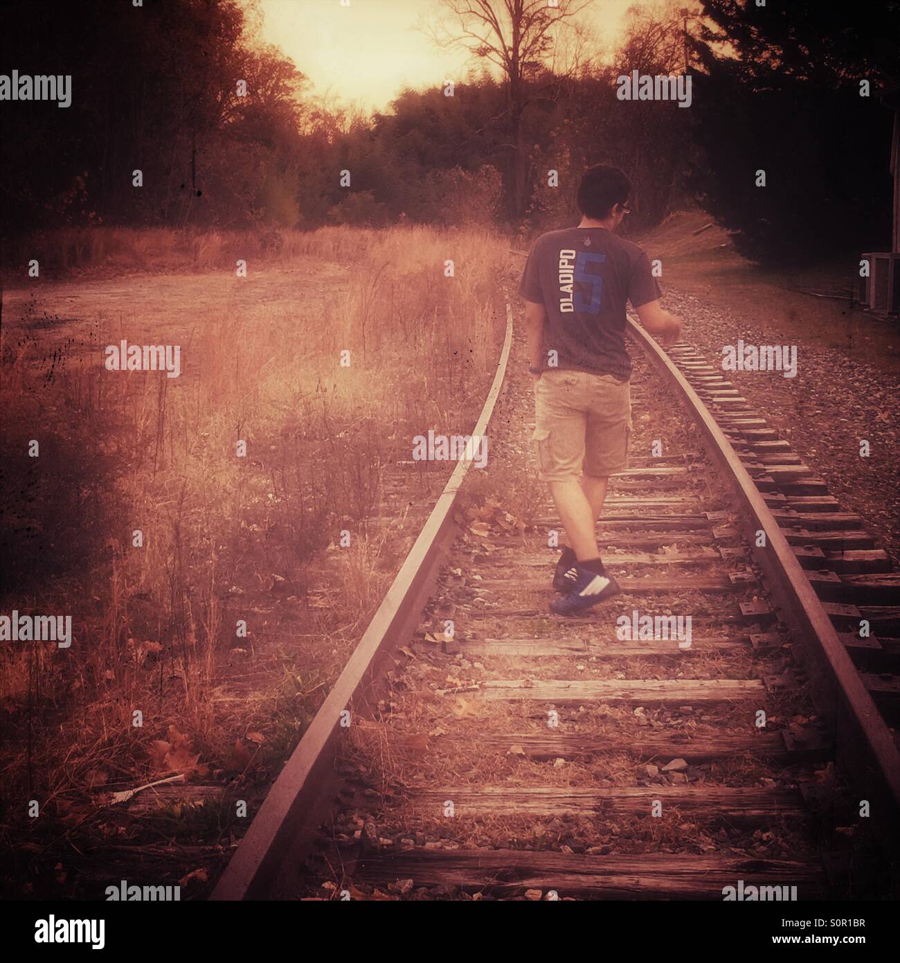 Alone Boy In Railway Track