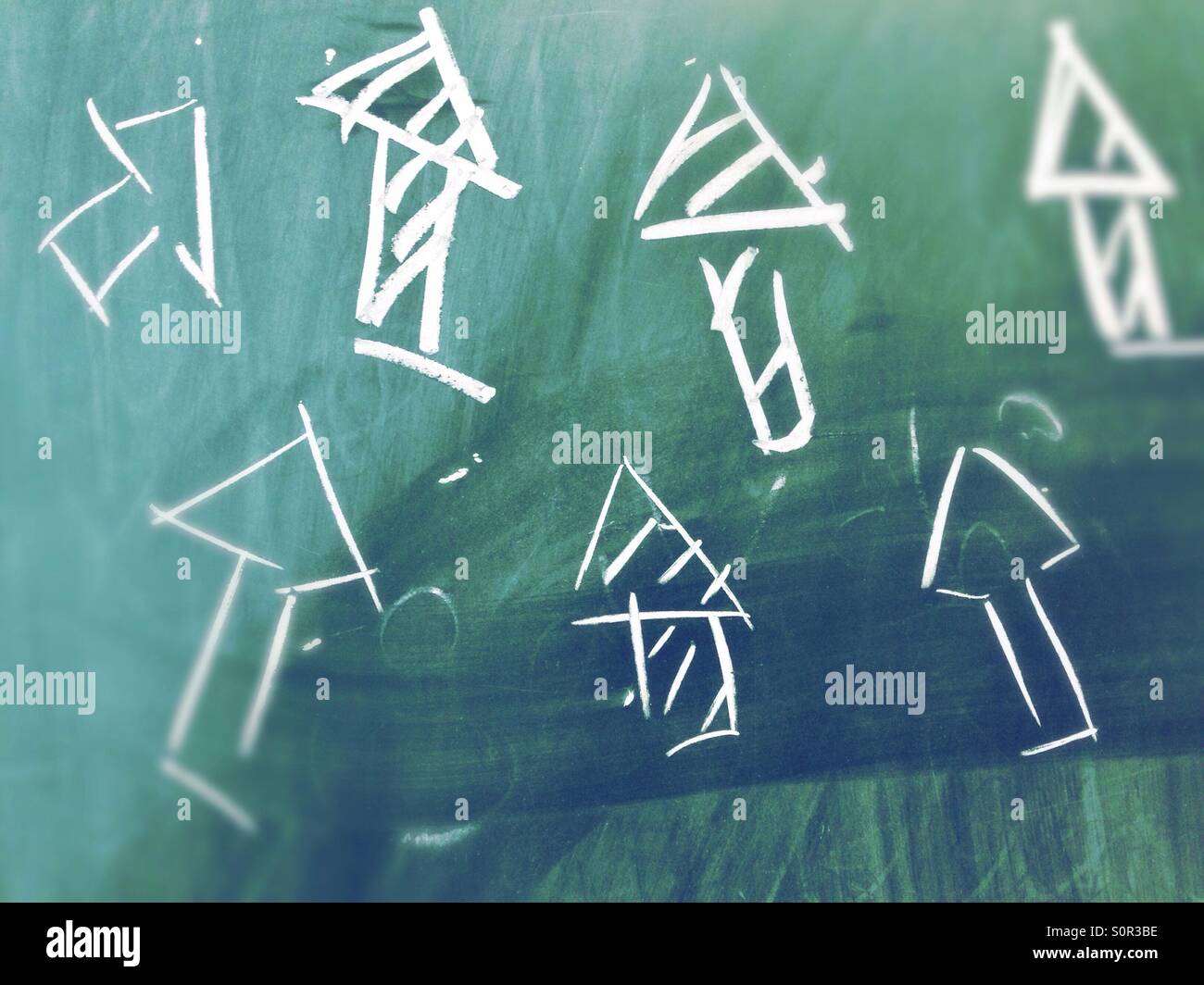 Chalk arrows on a green chalkboard Stock Photo - Alamy