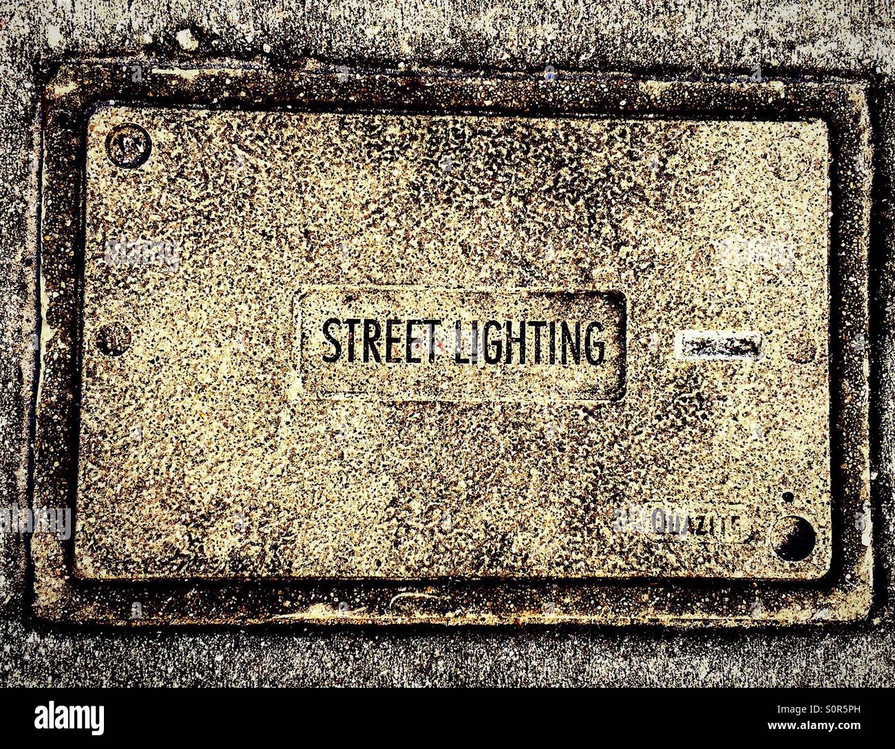 Street Lighting service cover Stock Photo - Alamy