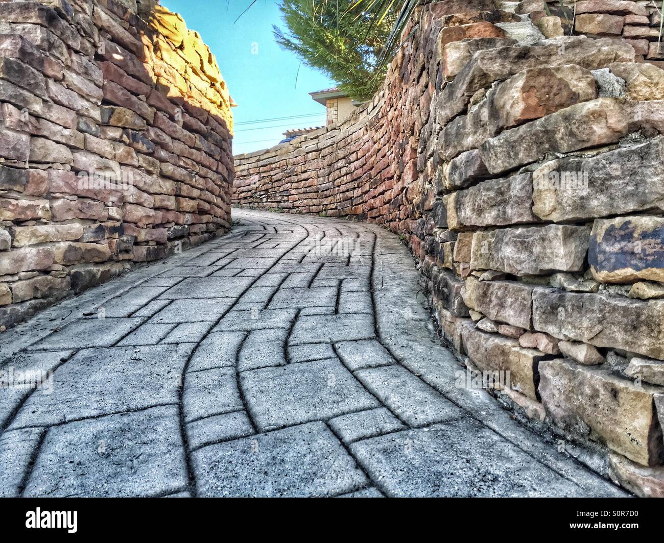 Winding brick path Stock Photo - Alamy