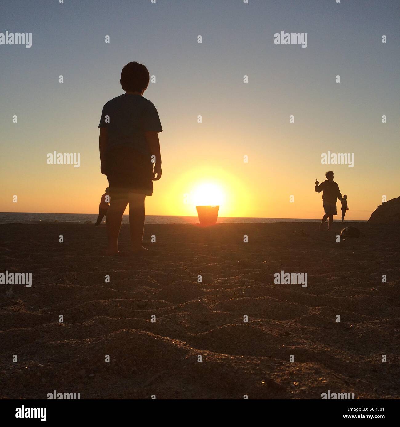 Staring at the sunset hi-res stock photography and images - Alamy