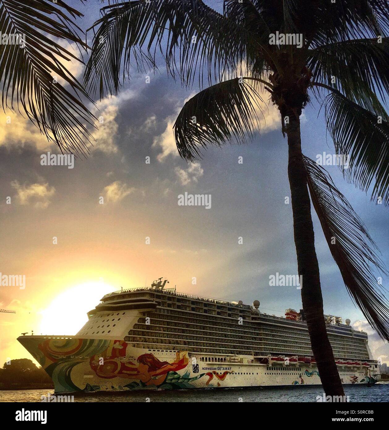 Cruise Ship at Sunset Stock Photo - Alamy