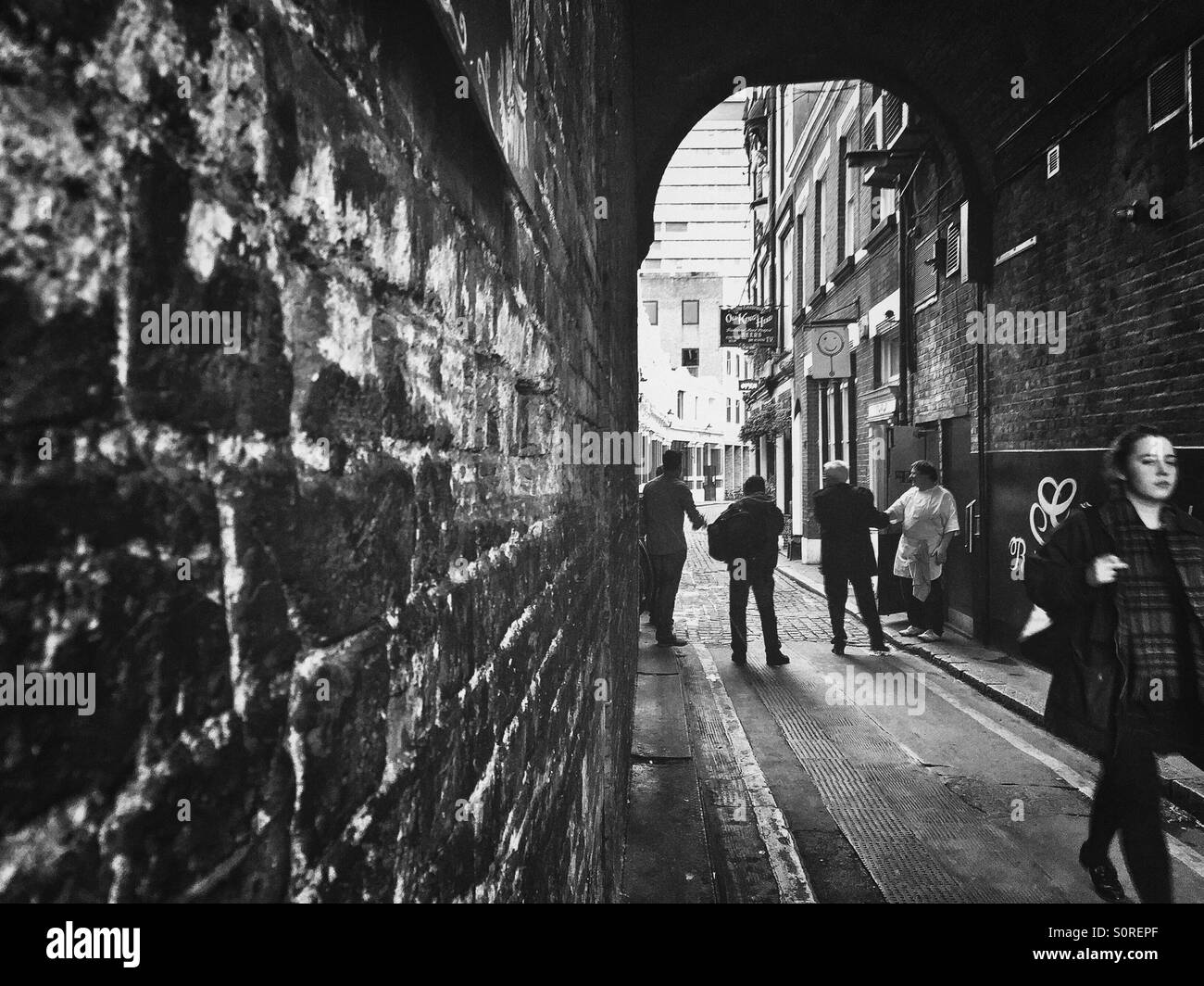 Alleyway wall hi-res stock photography and images - Alamy