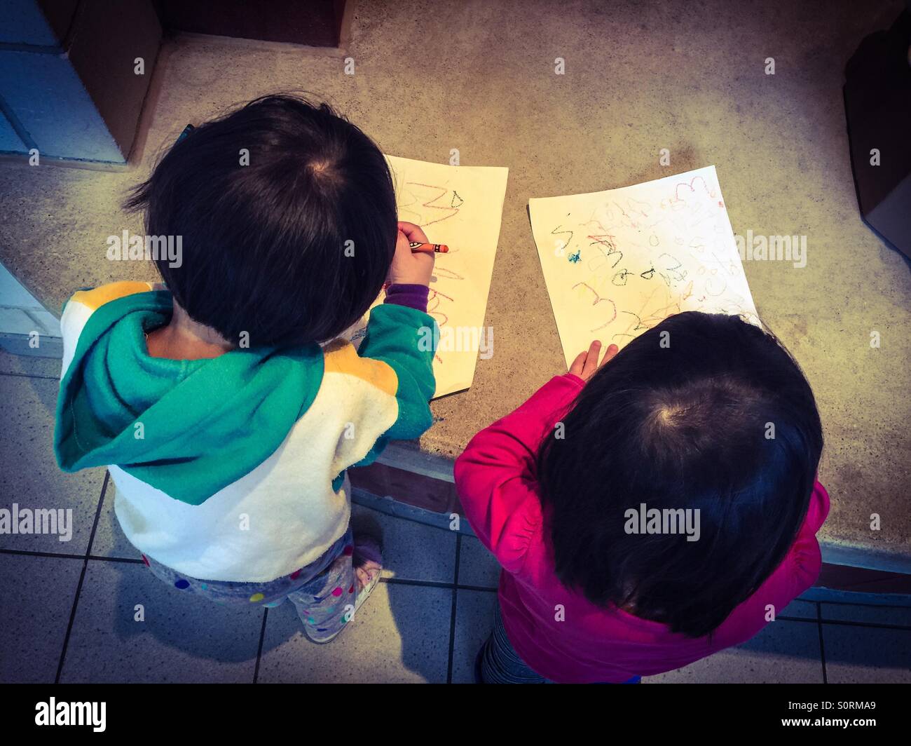 Children colouring hi-res stock photography and images - Alamy
